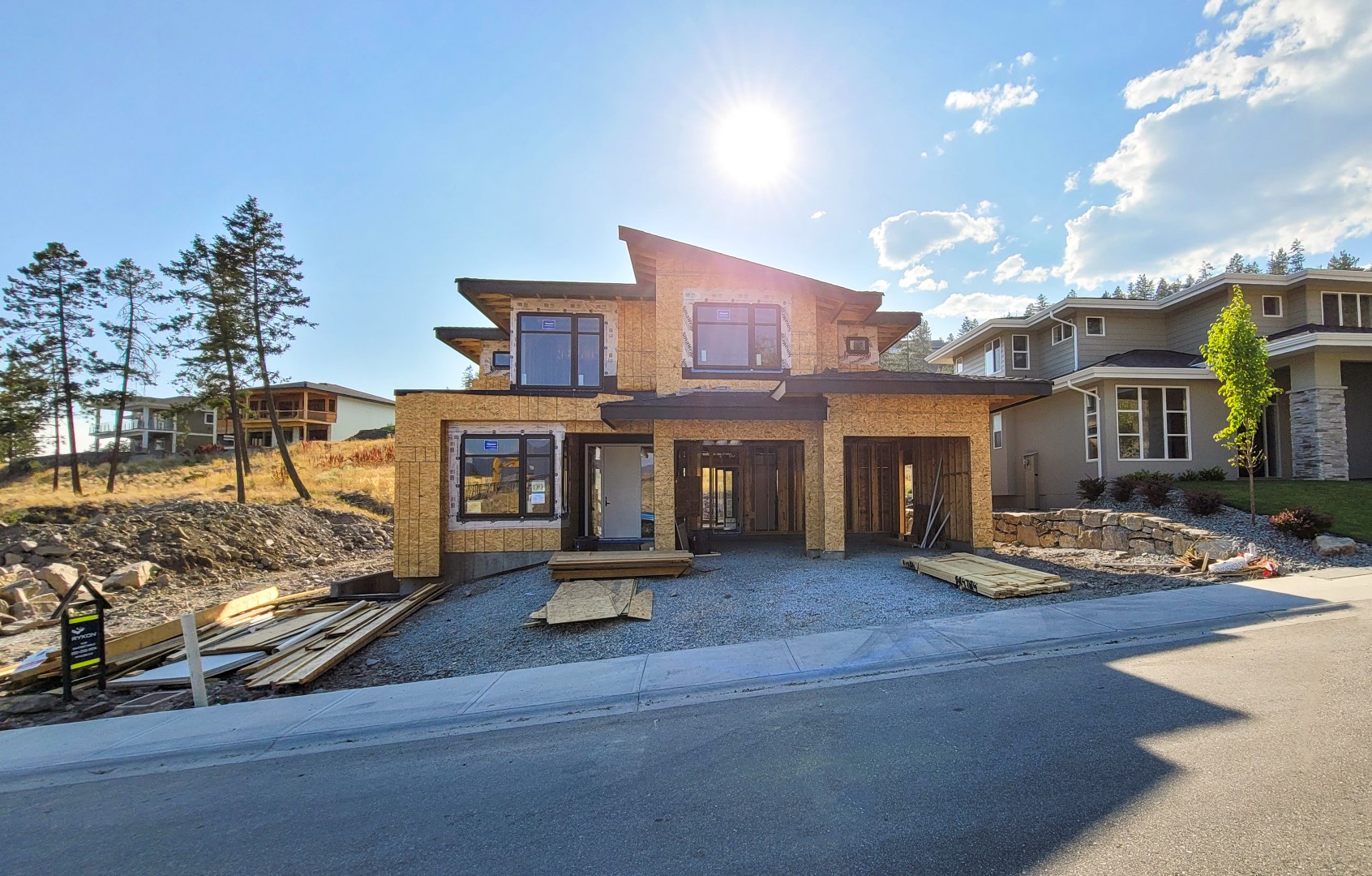 Echo Ridge Lot 49, Front Door and More Windows Done • Rykon Construction