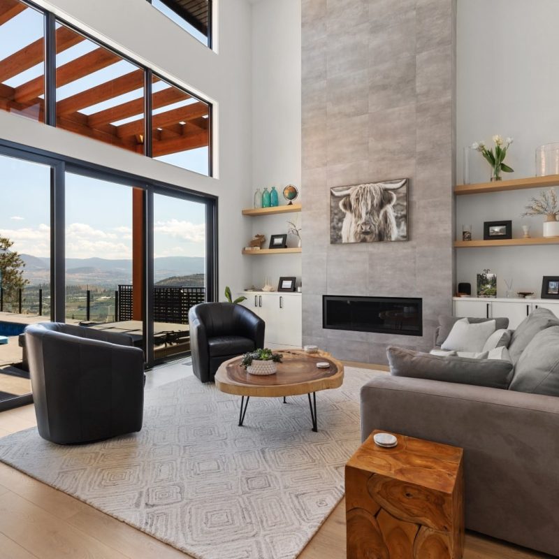 Kestrel Ridge - Show Home Featured Fireplace • Rykon Construction